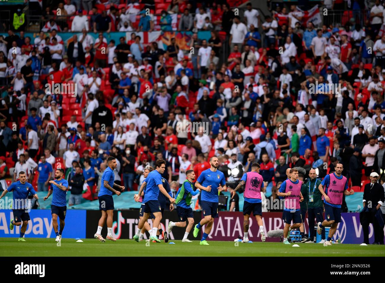 Italian players warm up before the Euro 2020 soccer final match between ...