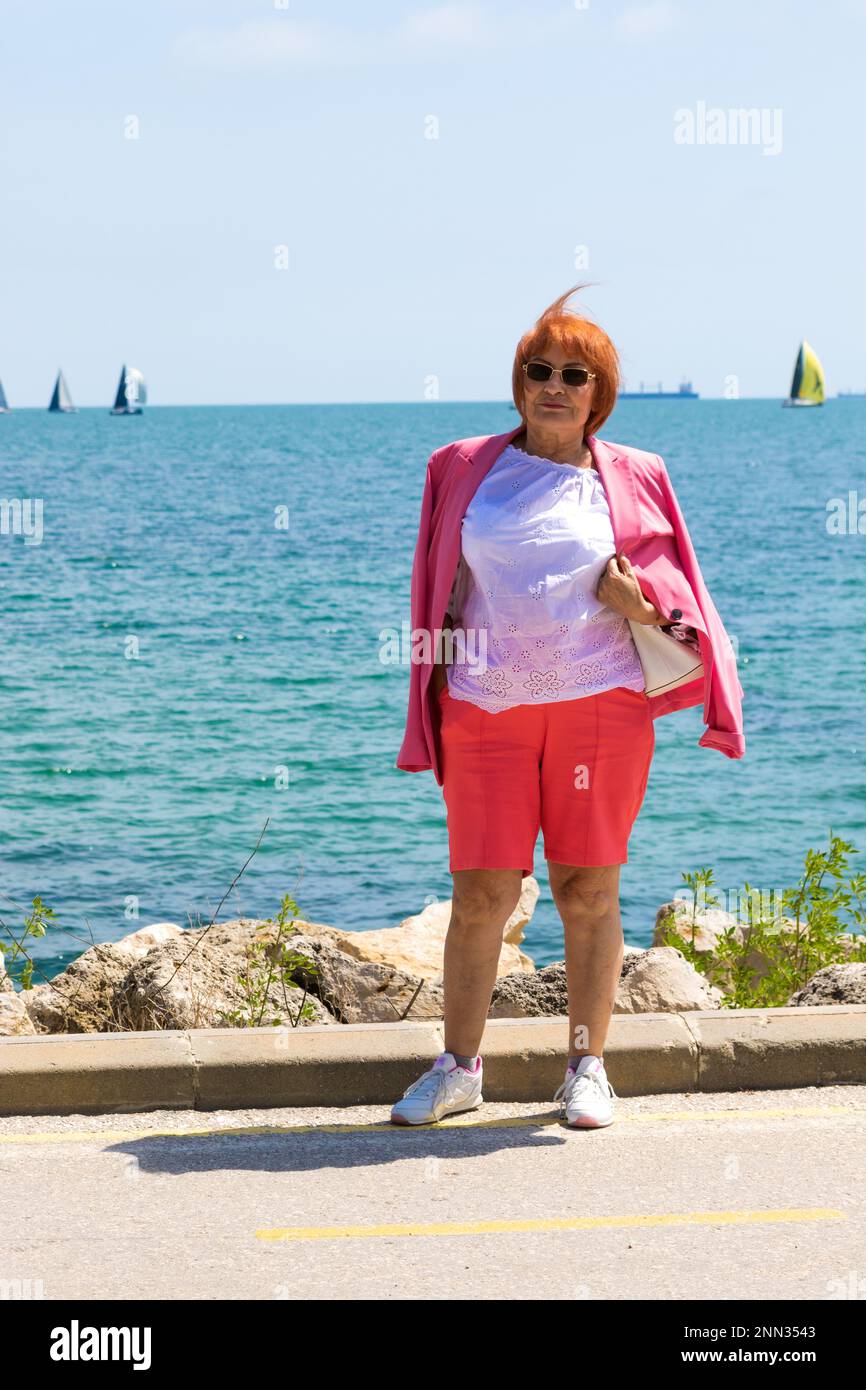 Senior Elegant 73 Years Old Lady On A Walk On Nice Spring Day At Varna