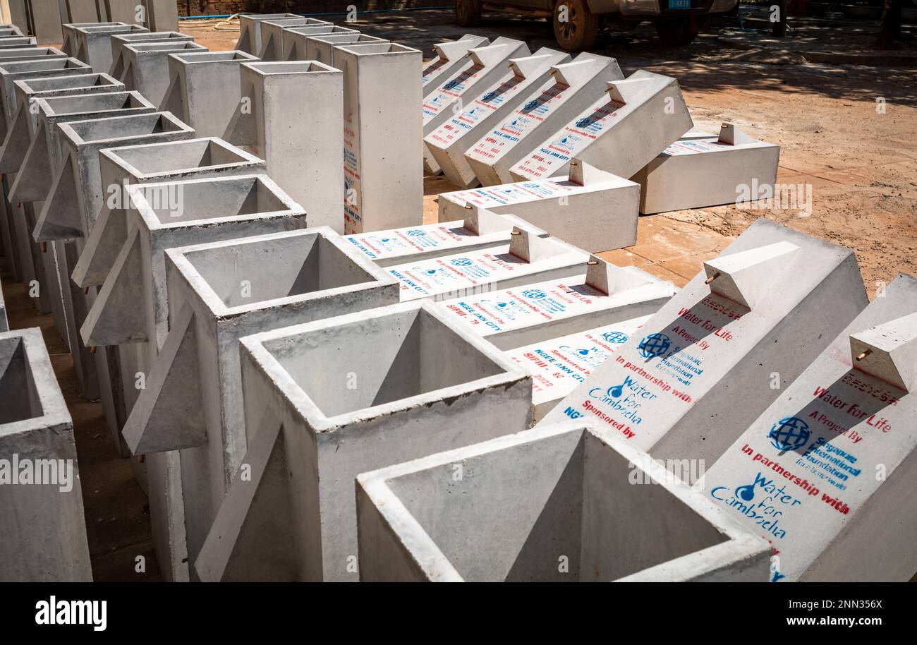 Biosand water filters awaiting finishing in the front yard of office ...