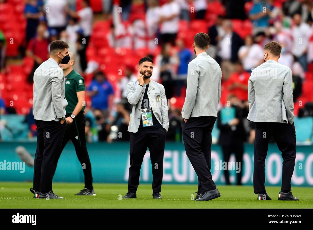 Italian players stand on the pitch ahead of the Euro 2020 soccer final ...