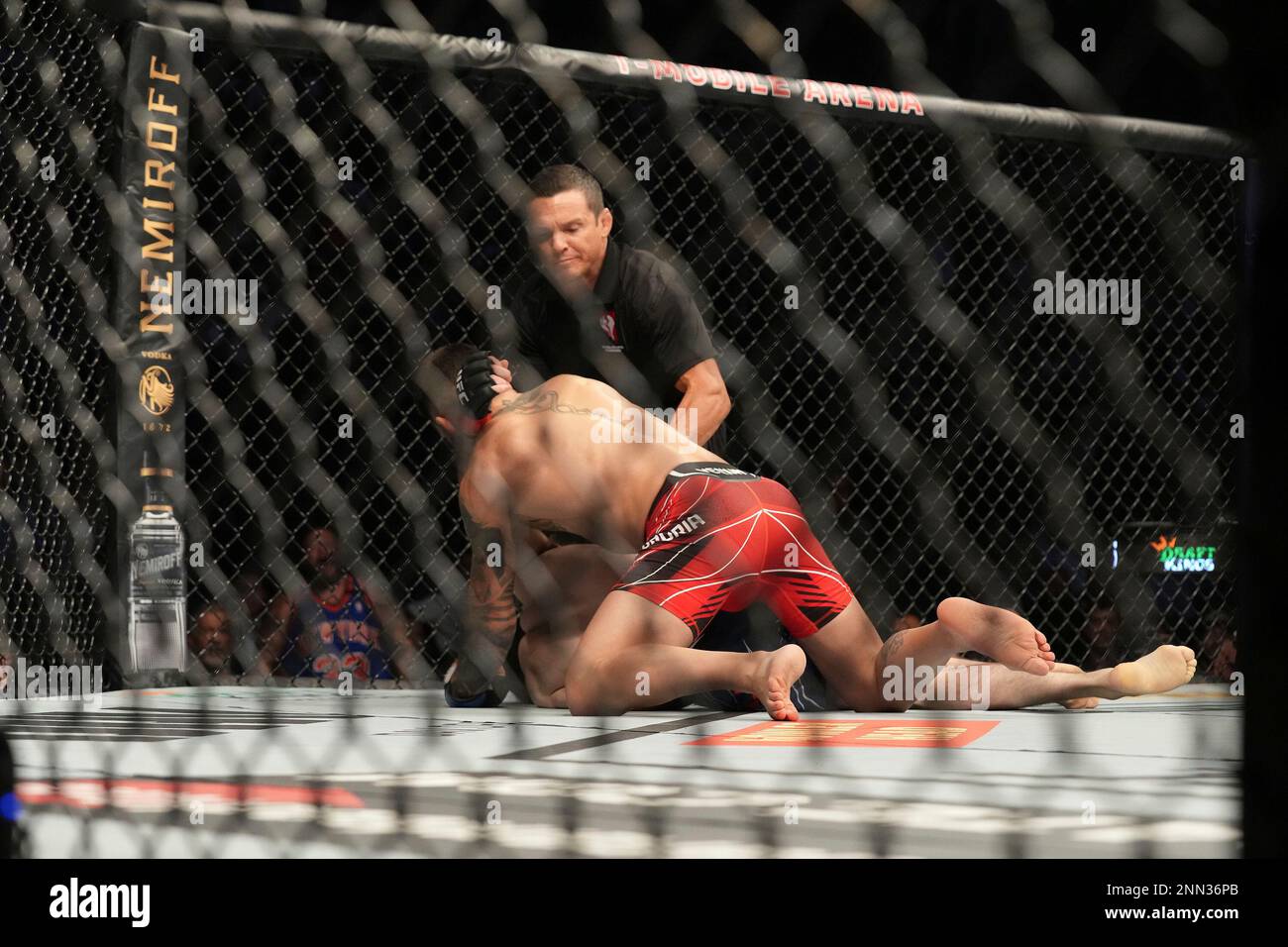 LAS VEGAS, NV - JULY 10: (R-L) Ilia Topuria battles Ryan Hall in their ...