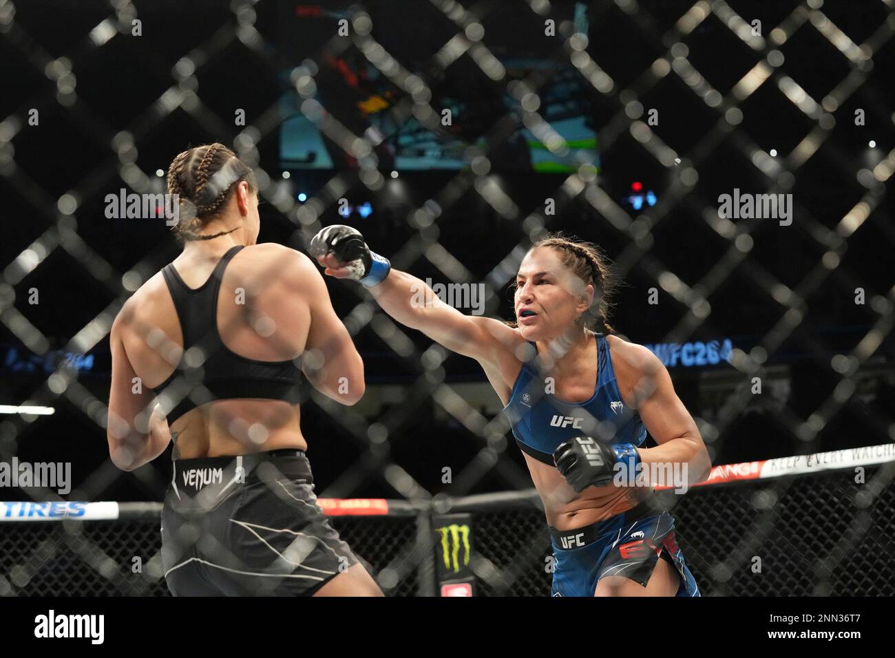 LAS VEGAS, NV - JULY 10: (R-L) Jessica Eye punches Jennifer Maia in ...