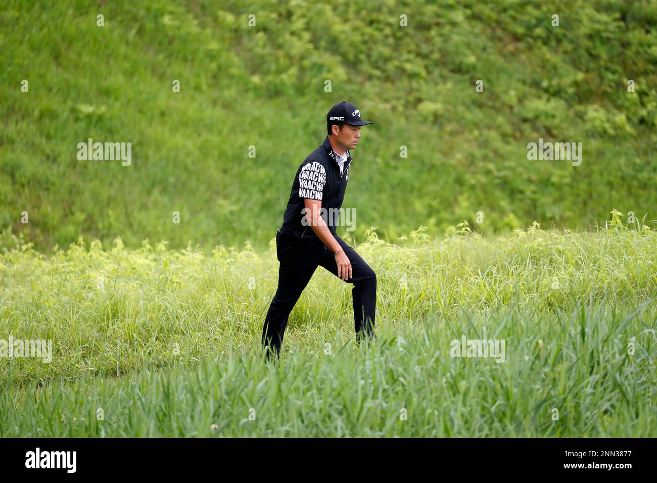 SILVIS, IL - JULY 10: PGA golfer Kevin Na walks the 5th hole during the ...