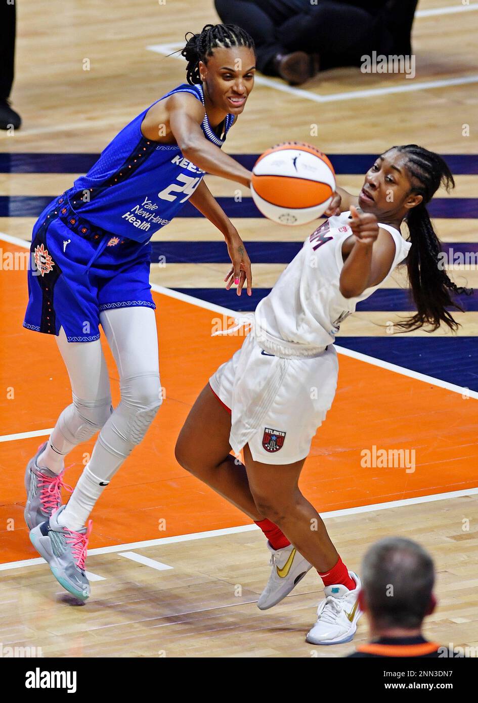 Connecticut Sun forward DeWanna Bonner, left, tangles with Atlanta ...
