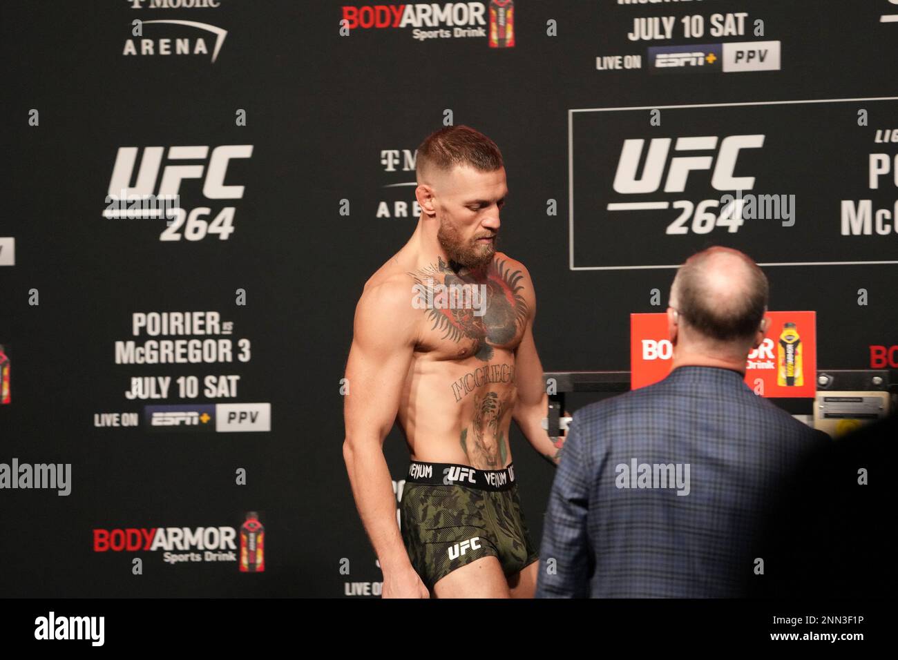 LAS VEGAS, NV - JULY 09: Conor McGregor steps on the scale during the ...