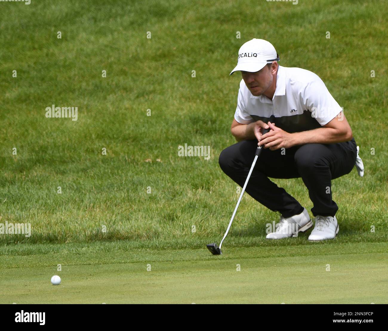 SILVIS, IL - JULY 08: Jonas Blixt lines ups his putt on the #1 hole ...