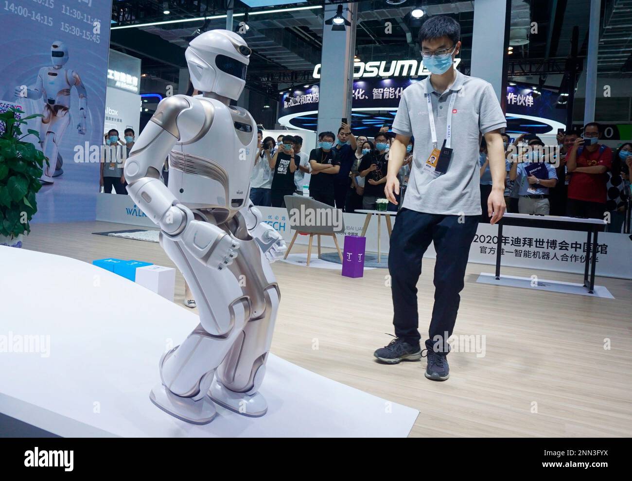 A Walker X humanoid developed by UBtech Robotics performs at the World ...
