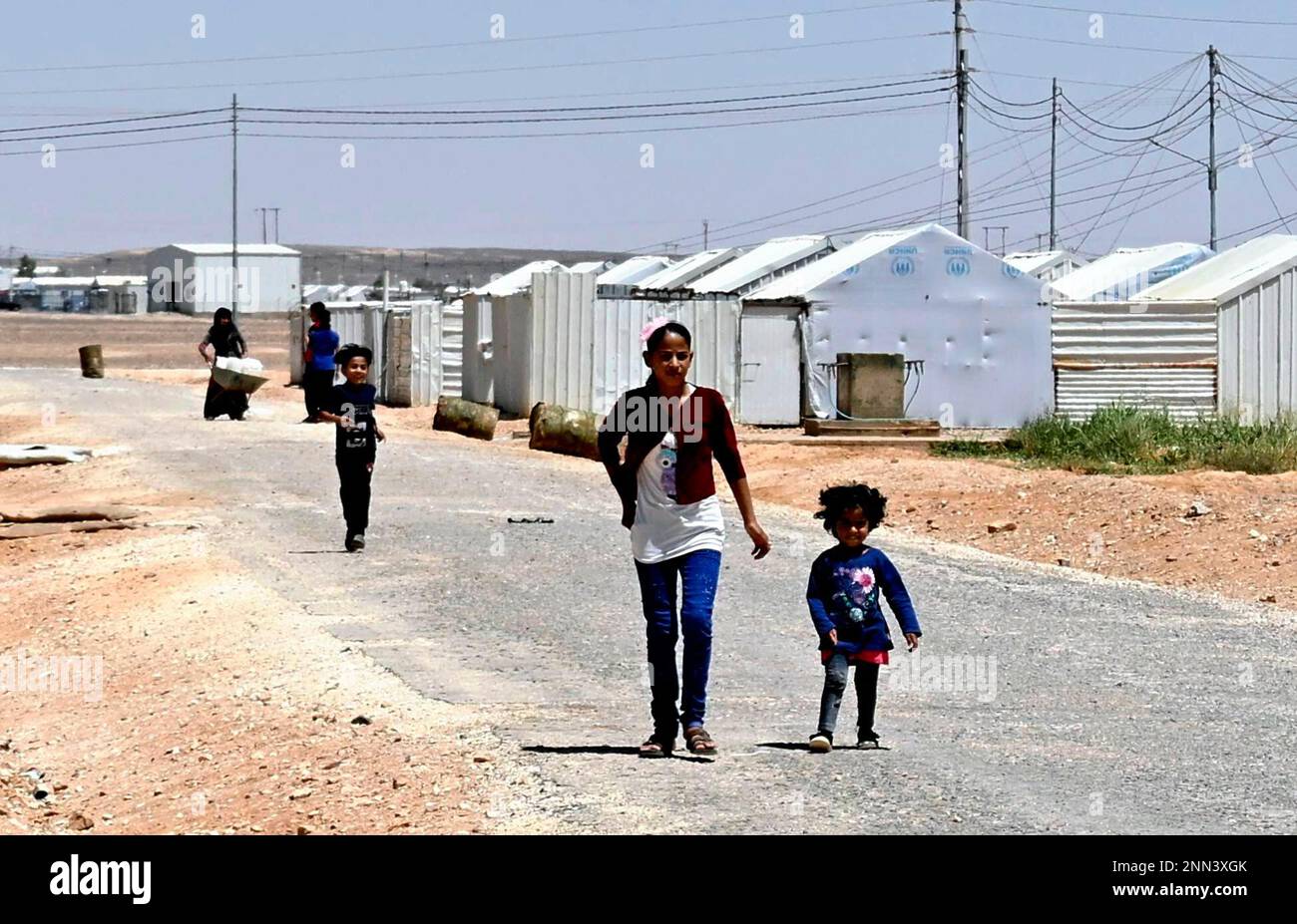Refugees are pictured at Azraq refugee camp in eastern Jordan on June 27, 2021. About 43,000 ...