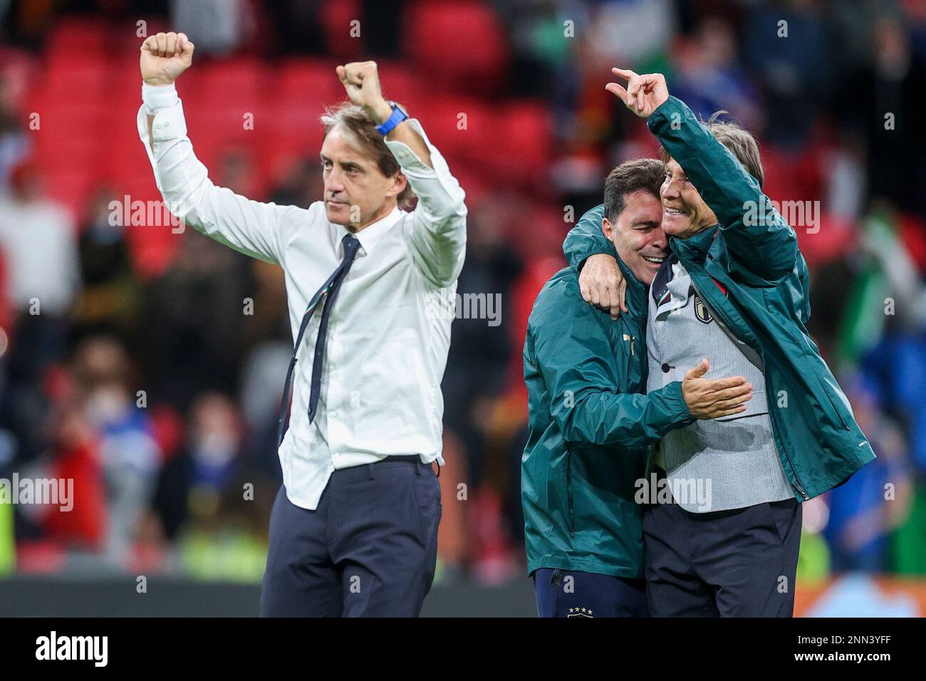 Italy's manager Roberto Mancini, left, celebrates after winning the ...