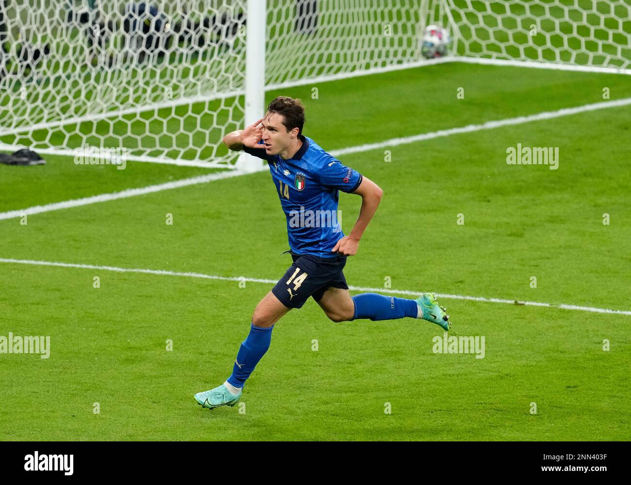 Italy's Federico Chiesa reacts after scoring his team's first goal ...