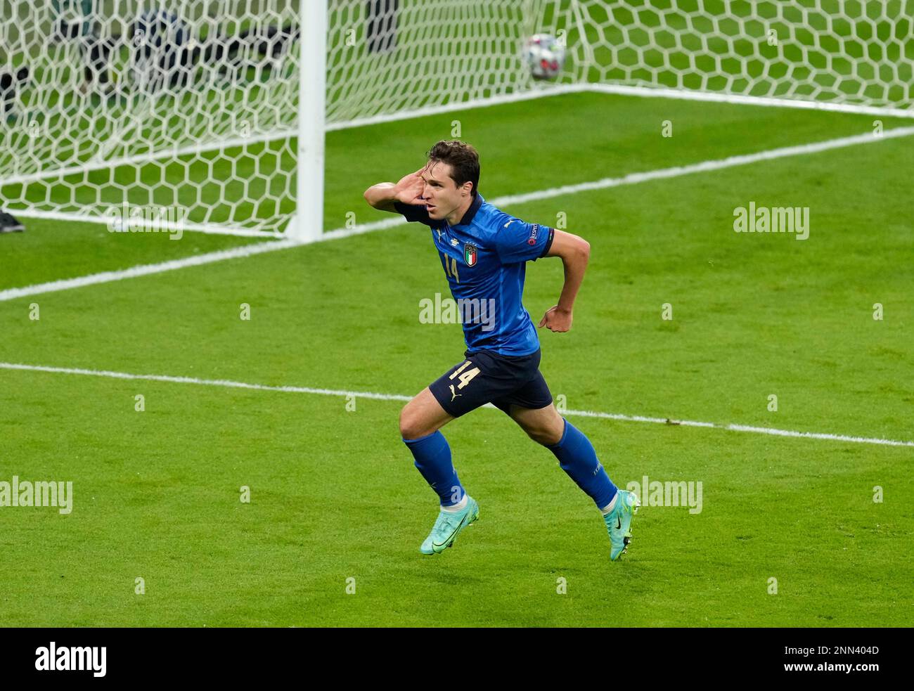 Italy's Federico Chiesa reacts after scoring his team's first goal ...