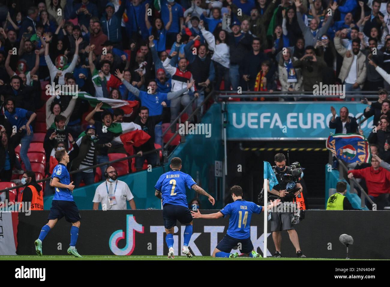 Italy's Federico Chiesa, right, celebrates after scoring his side's ...