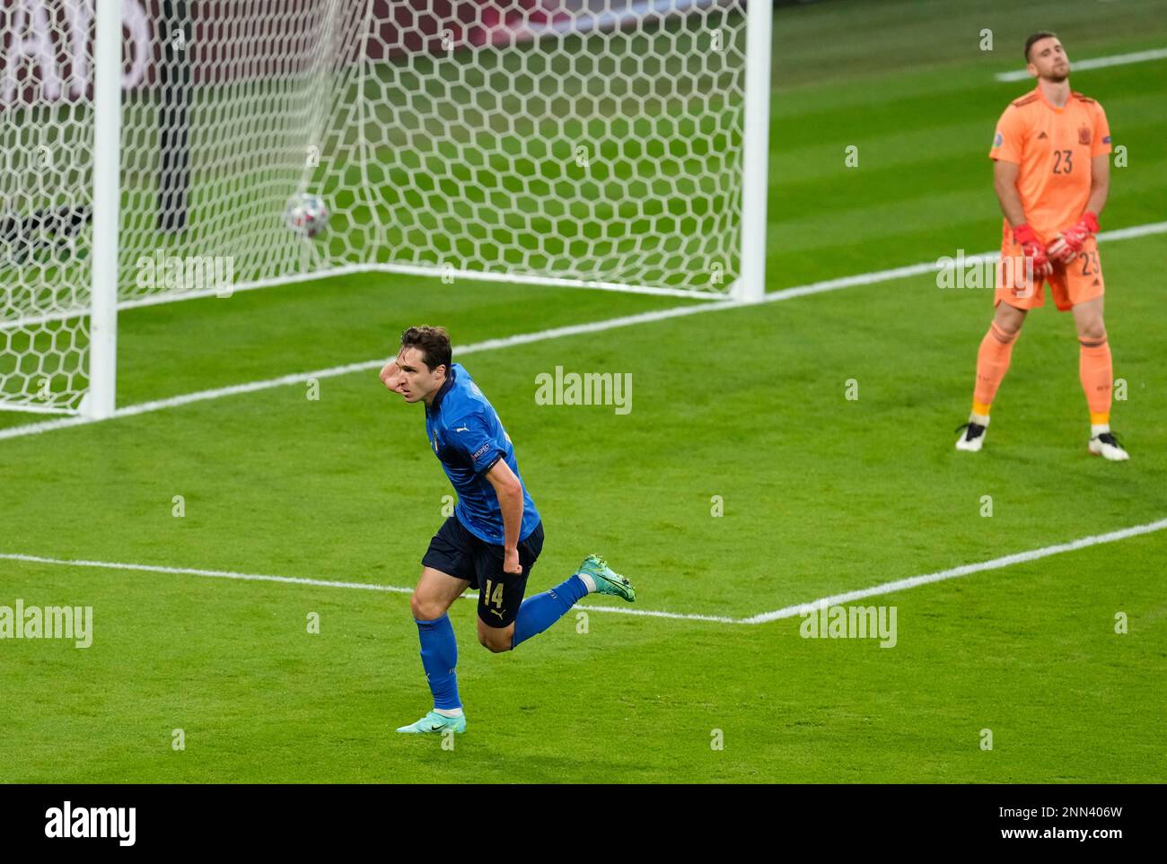 Italy's Federico Chiesa reacts after scoring his team's first goal ...