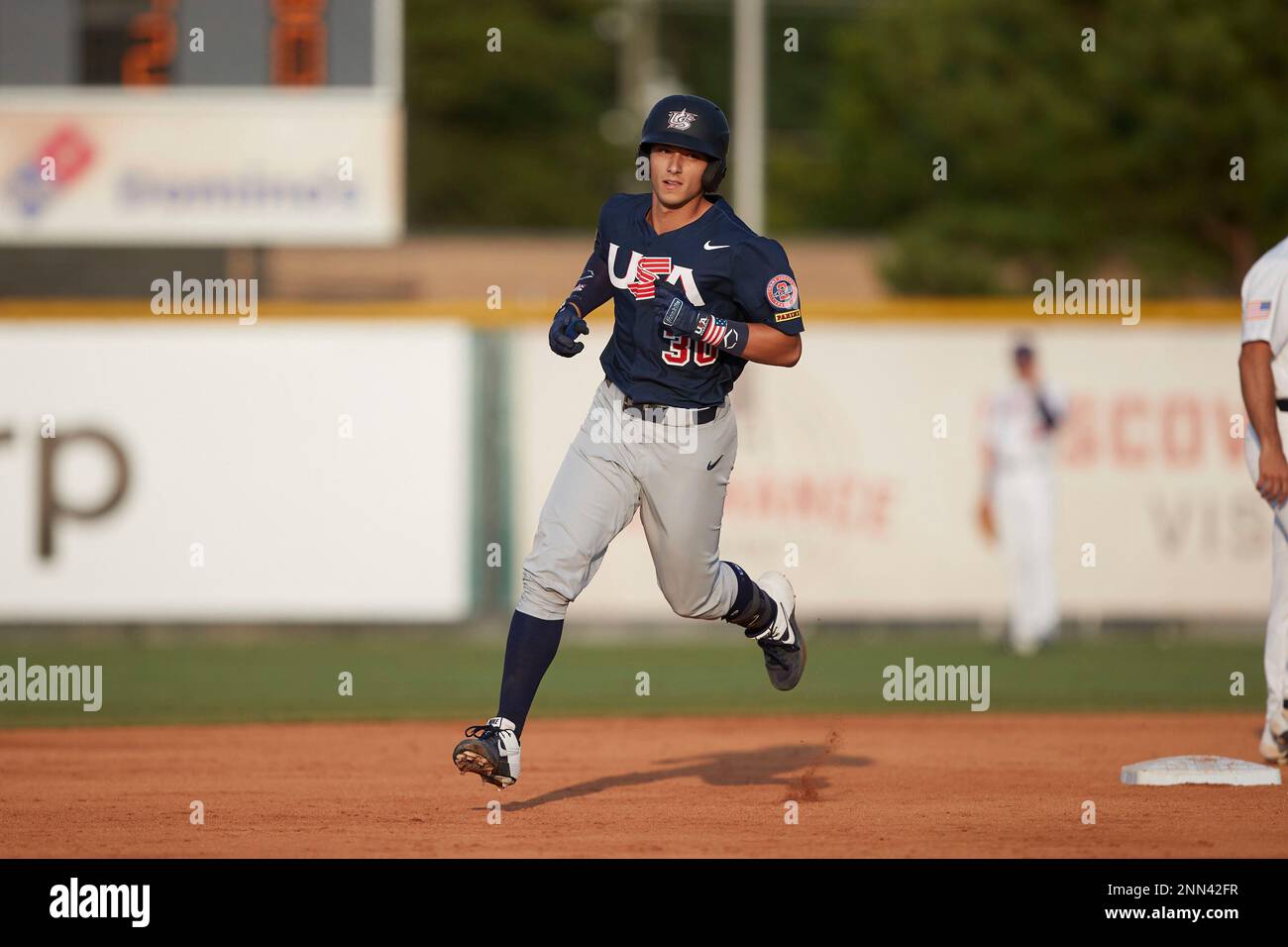 Carter Trice (30) (Old Dominion) of Team Stripes rounds the bases after ...