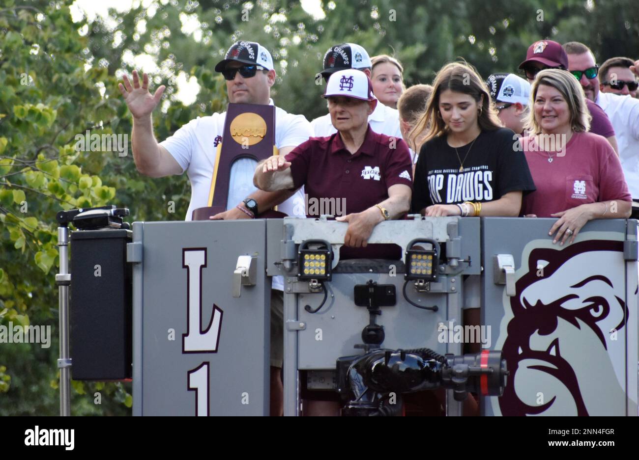Mississippi State baseball coach Chris Lemonis holds the championship ...