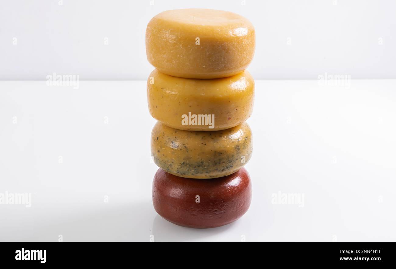 Different types of homemade traditional Bosnian cheese isolated on a ...