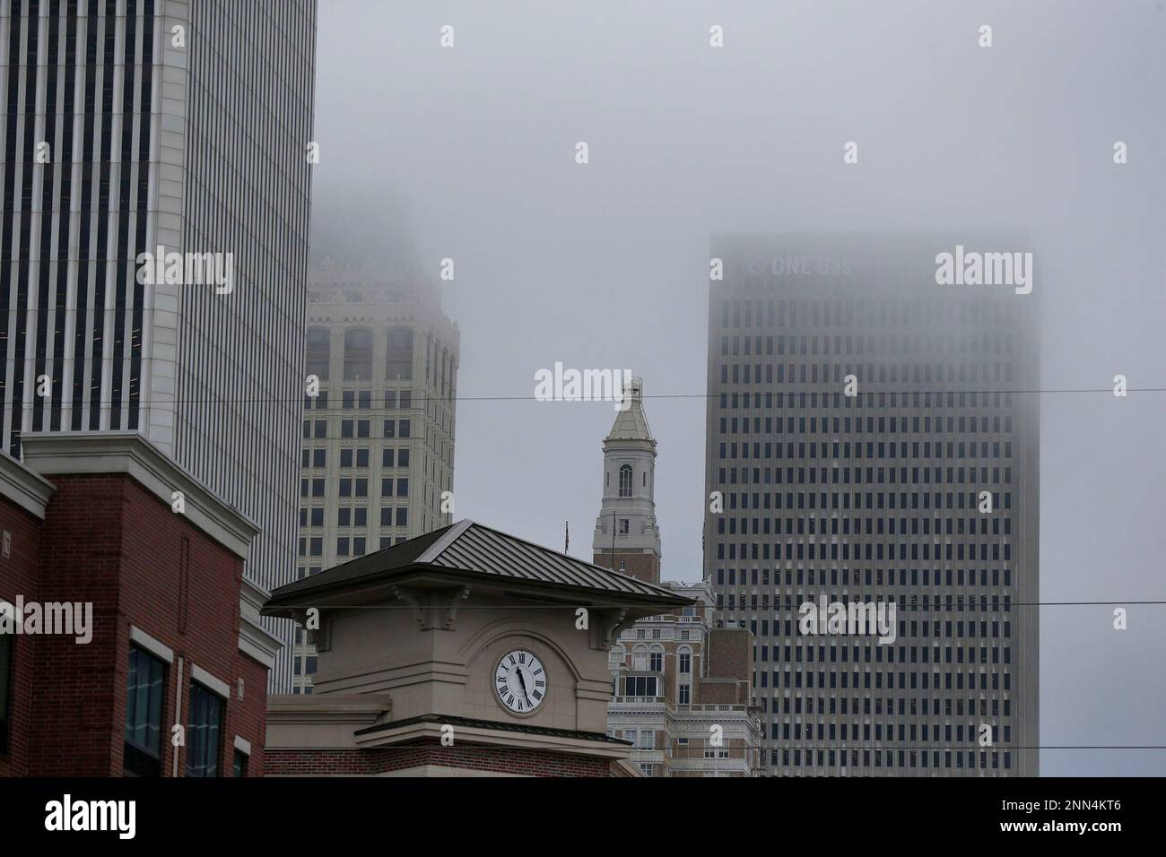 Low clouds in downtown during a rain storm in Tulsa, Okla., July 1 ...
