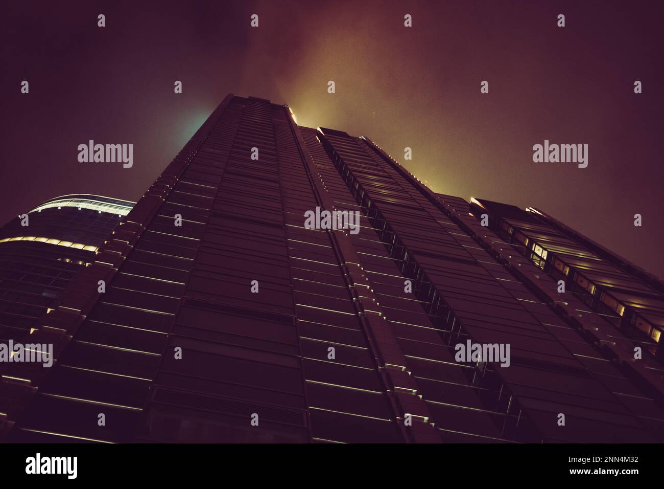 contemporary skyscraper at rainy night Stock Photo - Alamy