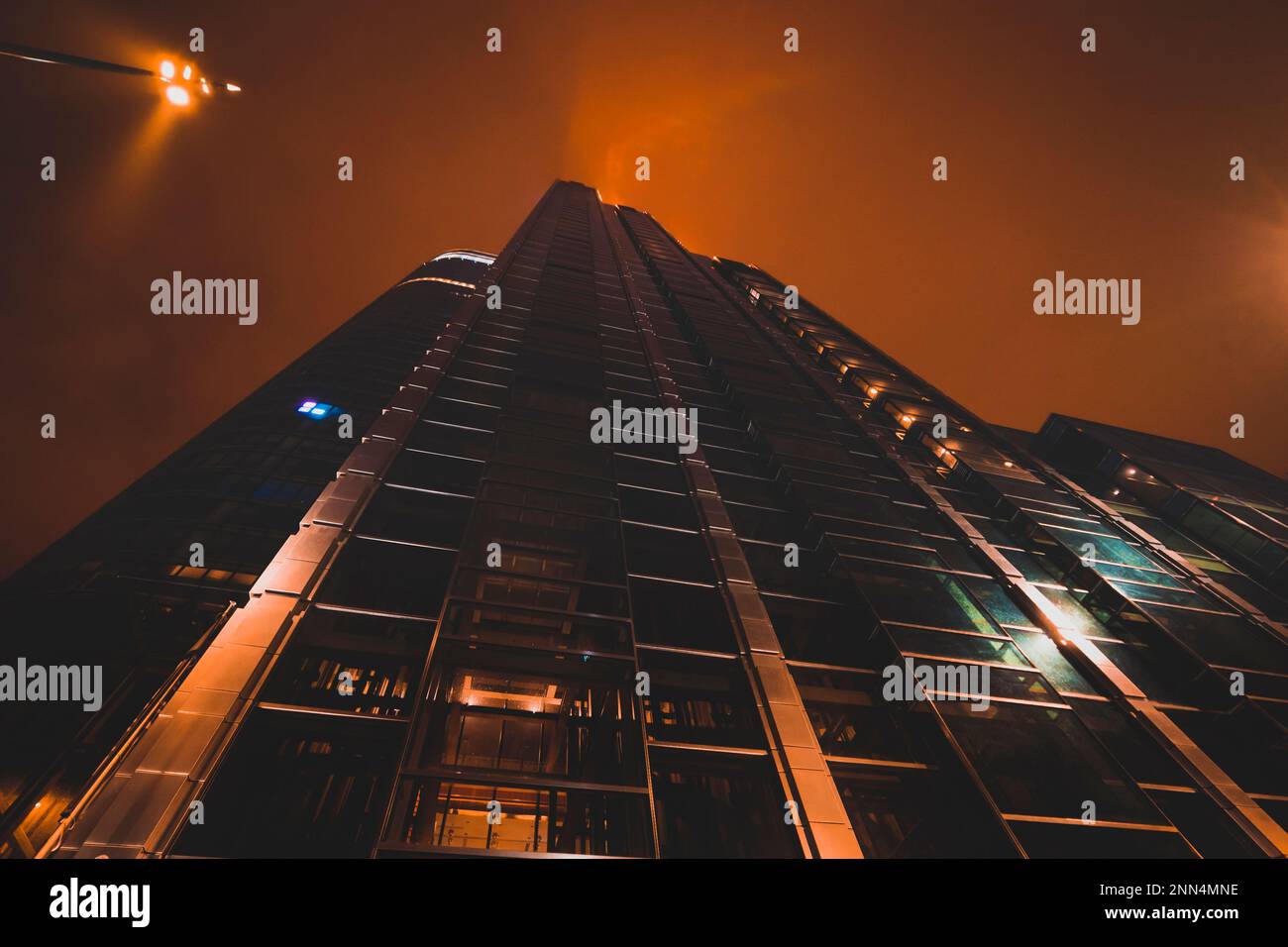 contemporary skyscraper at rainy night Stock Photo - Alamy