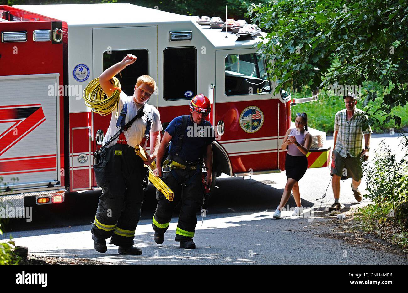 Pittston Twp. firemen walk up Doty St. in Pittston Twp., Pa. to help ... Pittston Twp. firemen walk up Doty St. in Pittston Twp., Pa. to help ...