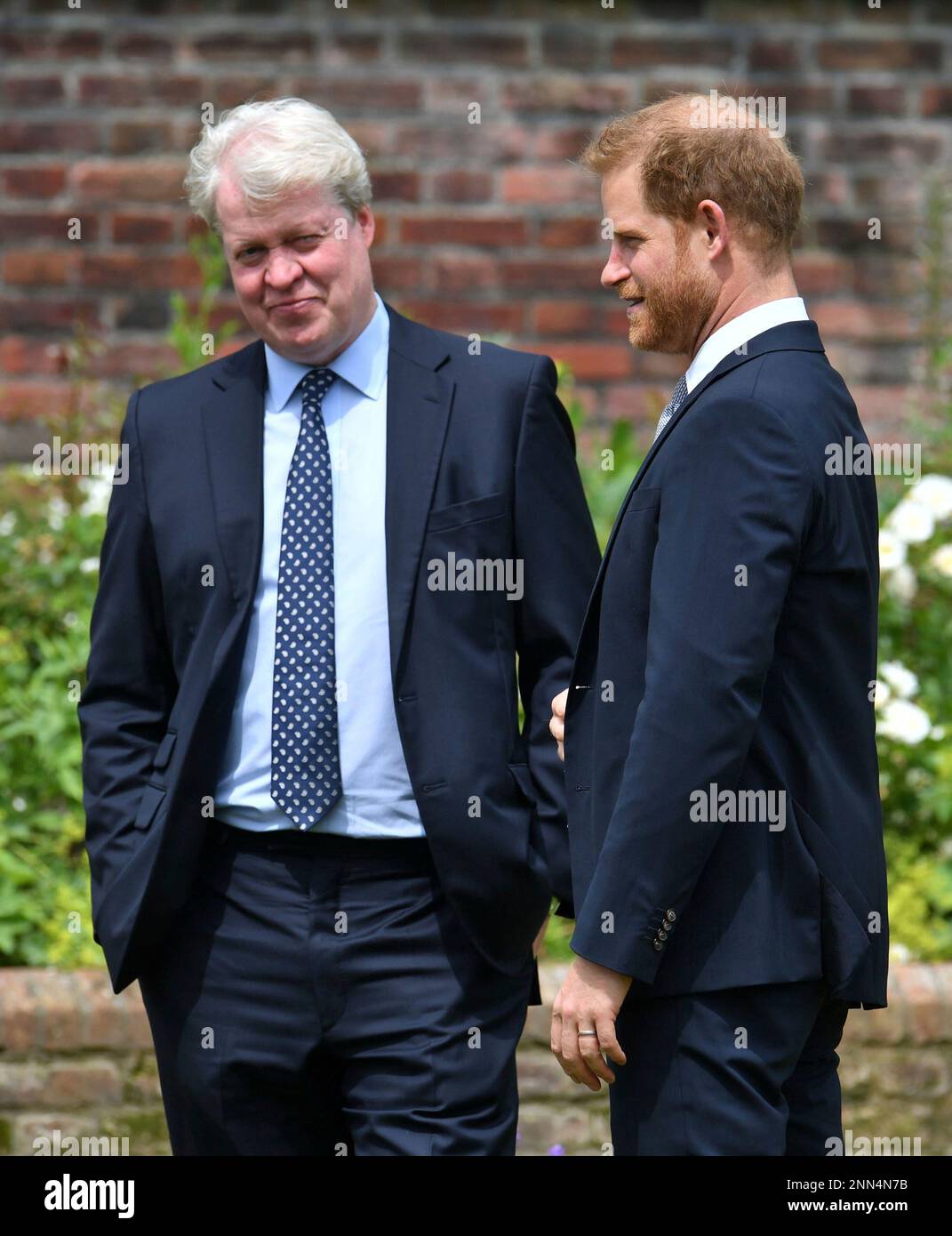 Britain's Prince Harry stands with his uncle, Charles Spencer as he and ...