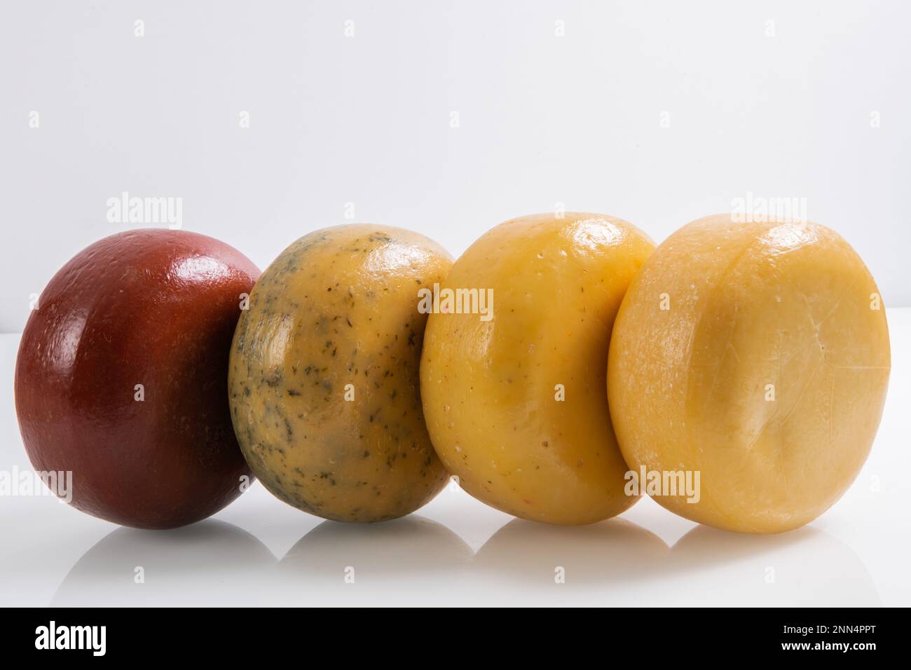 Different types of homemade traditional Bosnian cheese isolated on a ...