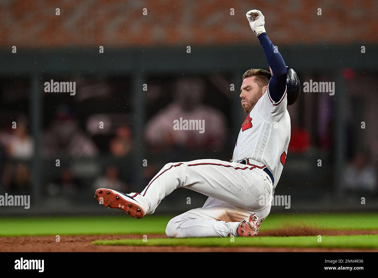 ATLANTA, GA – JUNE 30: Atlanta first baseman Freddie Freeman (5) slides ...