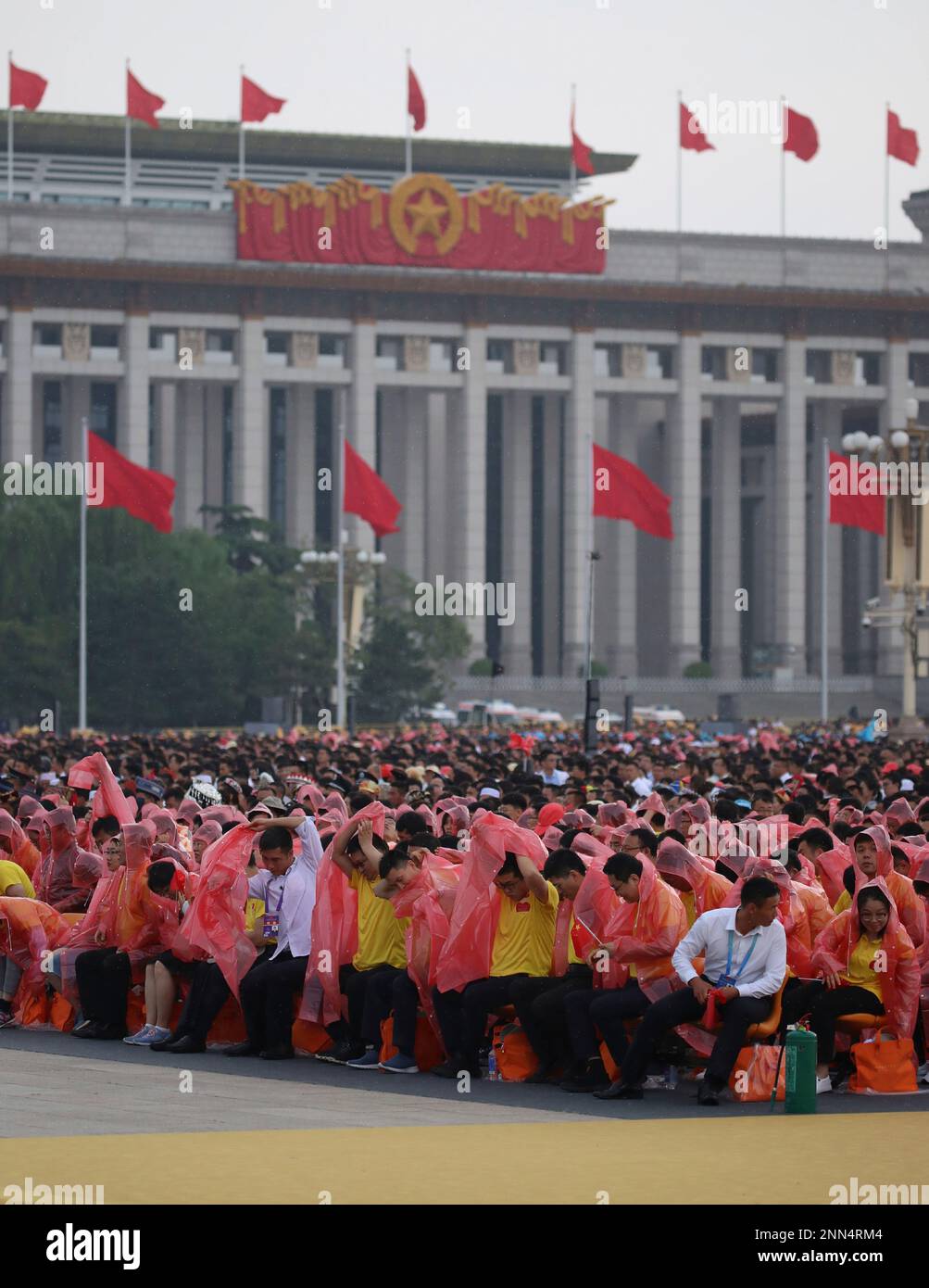 People attend a ceremony to commemorate the 100th anniversary of the ...