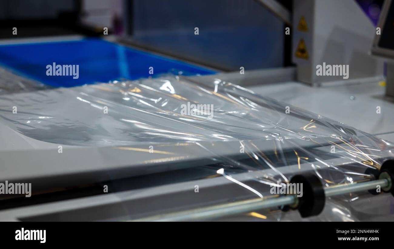 Conveyor Belt For Packaging In Transparent Polythene Stretch. Concept ...