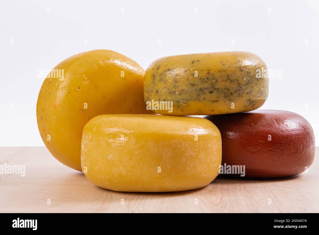 Different types of homemade traditional Bosnian cheese isolated on a ...