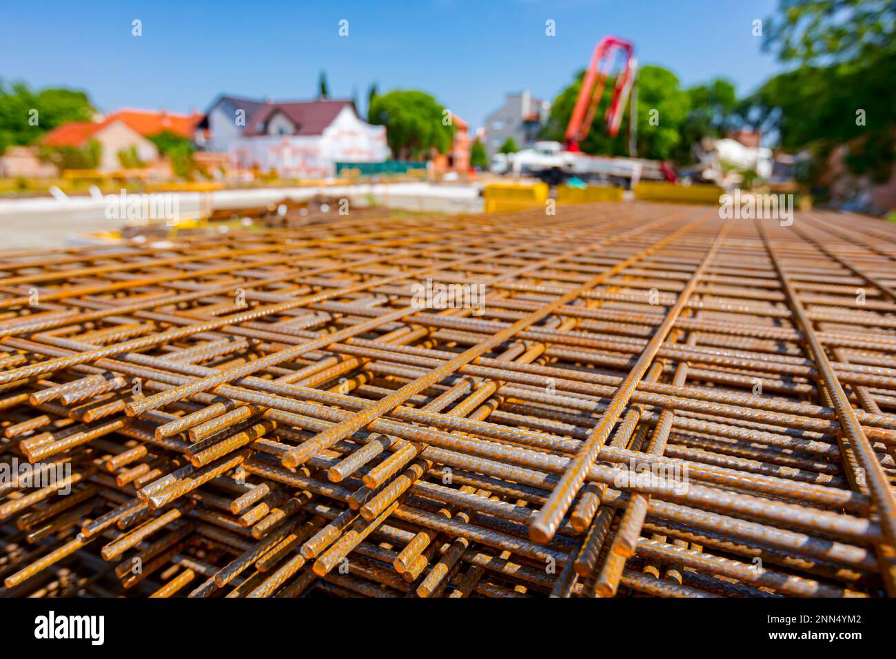 Pile of rusty rectangle steel reinforcement for concrete ready for ...