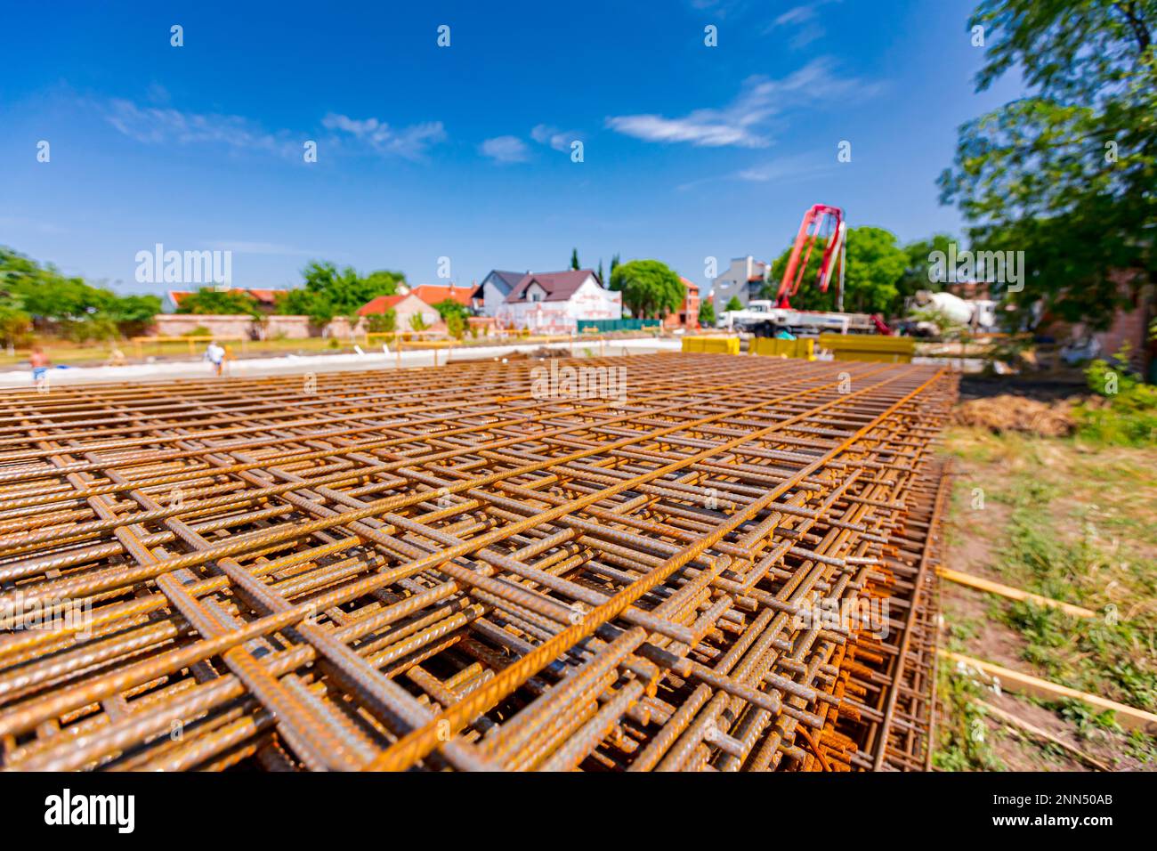 Pile of rusty rectangle steel reinforcement for concrete ready for ...
