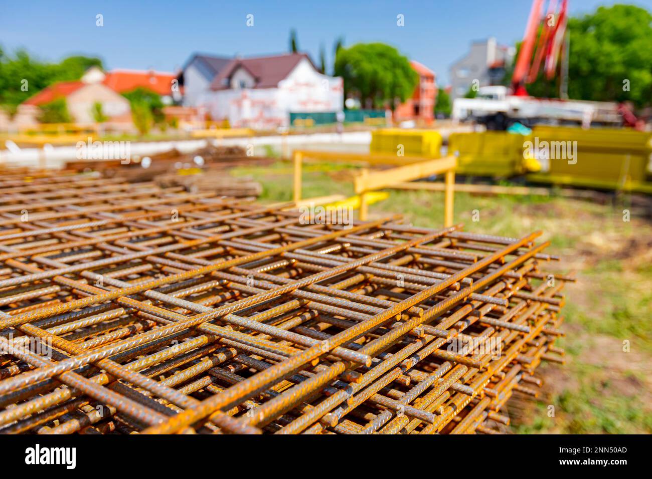 Pile of rusty rectangle steel reinforcement for concrete ready for ...