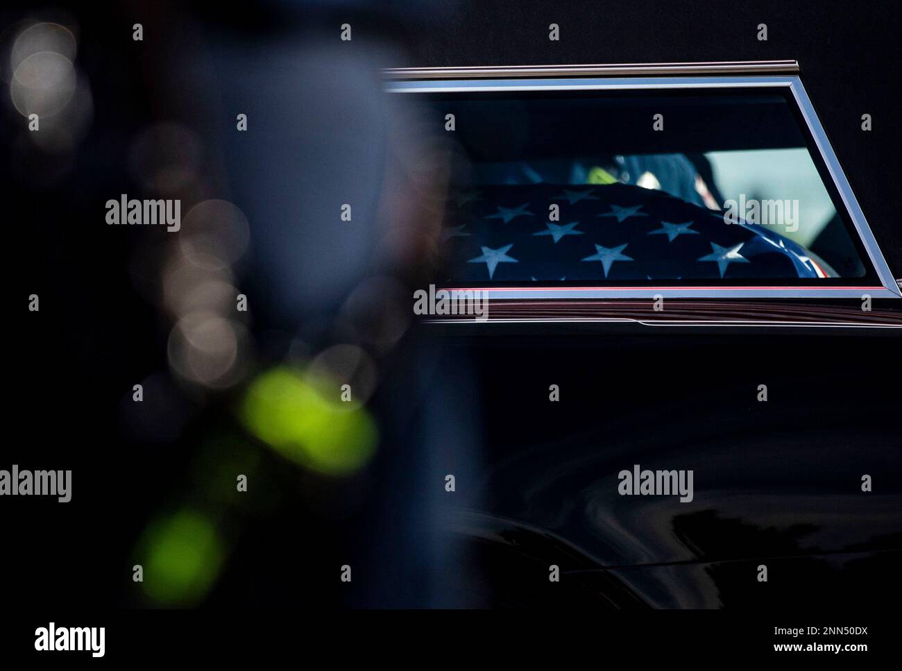 The casket of slain Arvada police officer Gordon Beesley during a ...