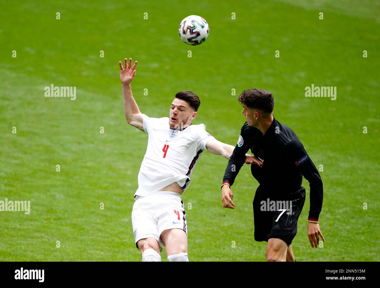 England's Declan Rice, left, duels for the ball with Germany's Kai ...