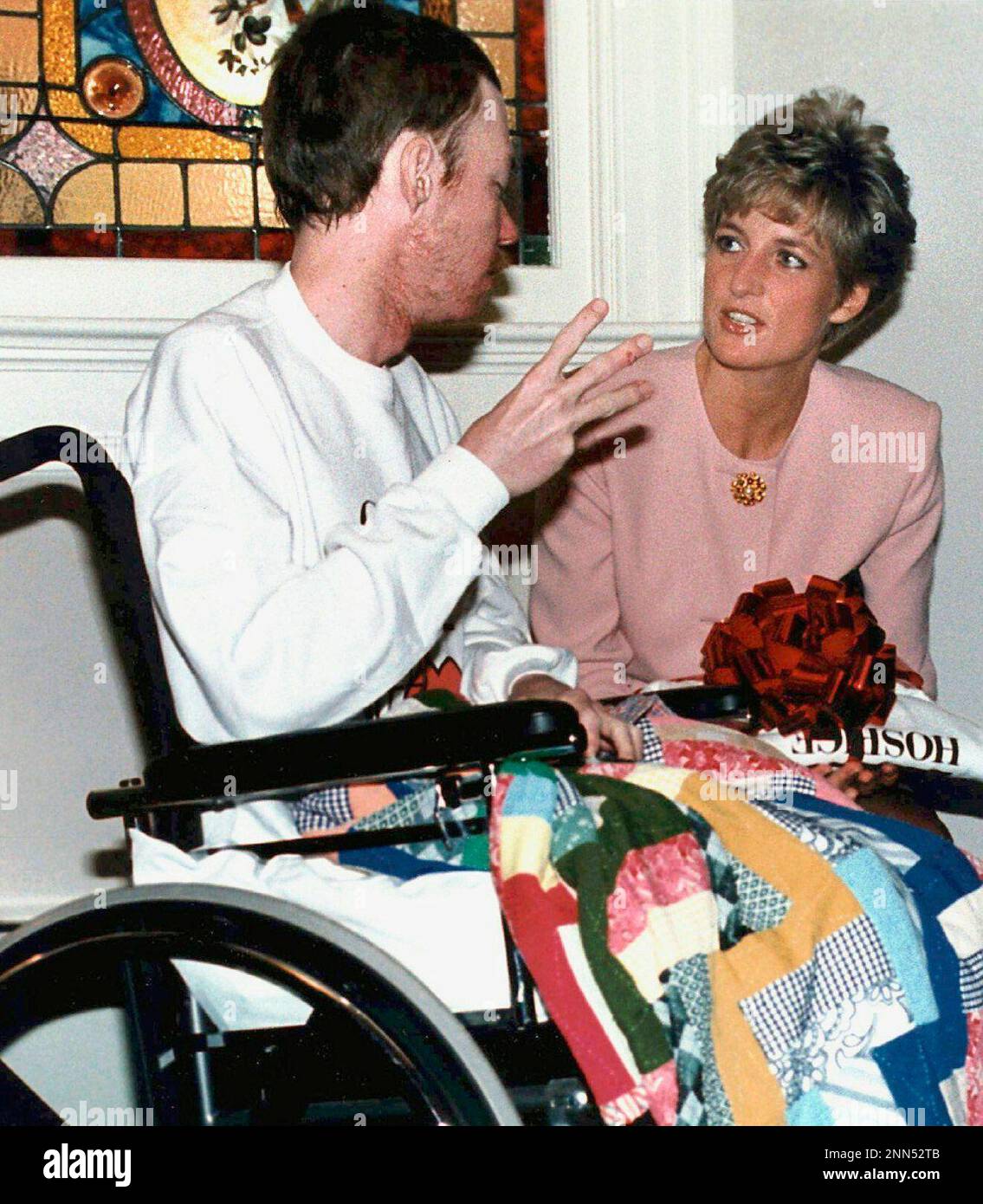 FILE- In this file photo dated Oct. 26, 1991, Princess Diana talks with ...