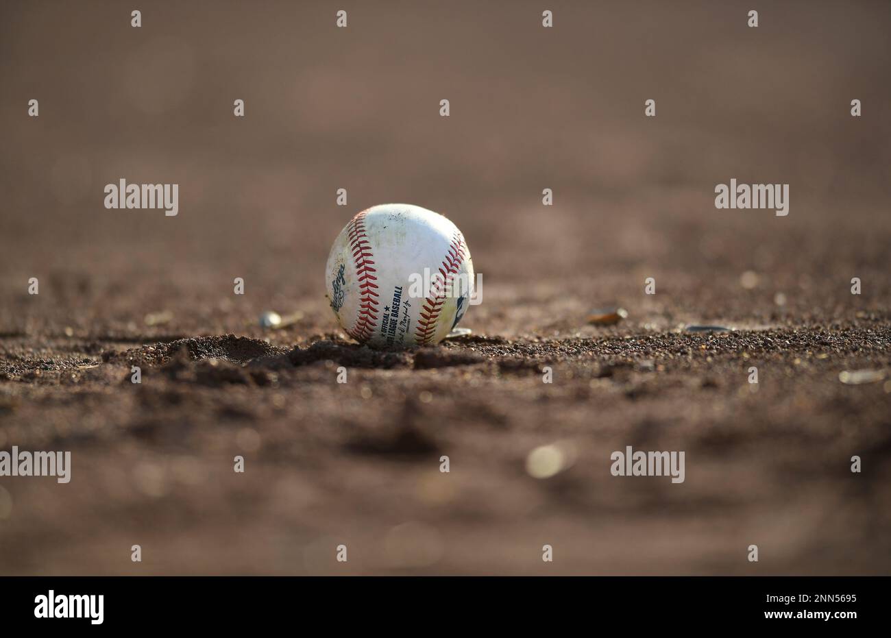 LOS ANGELES, CA - JUNE 27: A game ball seen on the warning track as the ...