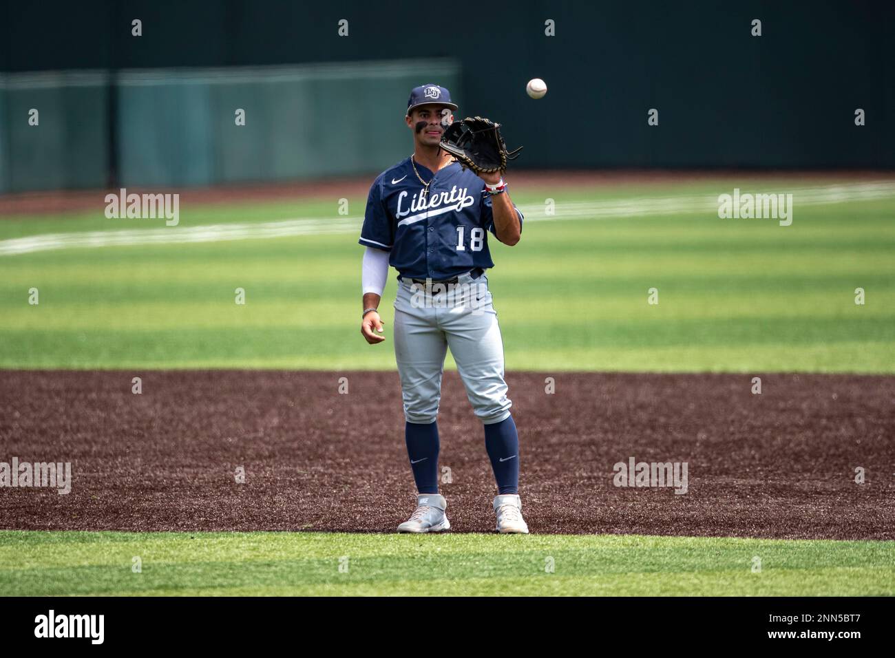 Liberty Flames shortstop Cam Locklear (18) on defense against the Duke ...