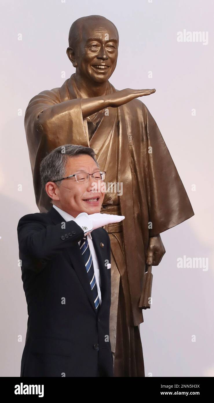 A bronze statue of Japanese comedian Ken Shimura, who died of pneumonia ...