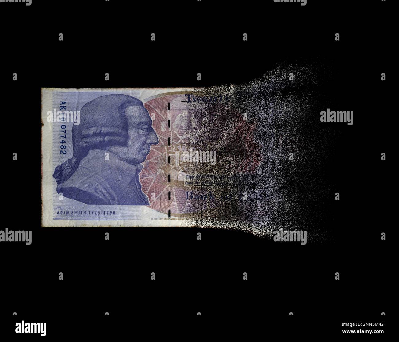 A concept image showing a half dissolved flat paper UK pound bank note ...