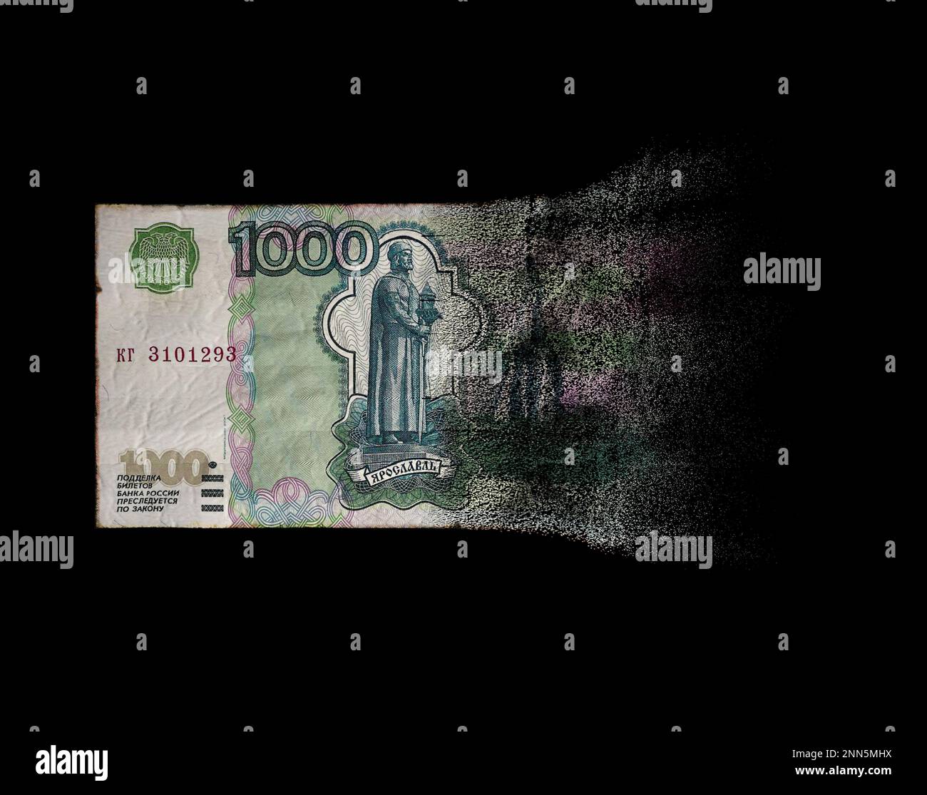 A concept image showing a half dissolved flat paper russian ruble bank ...