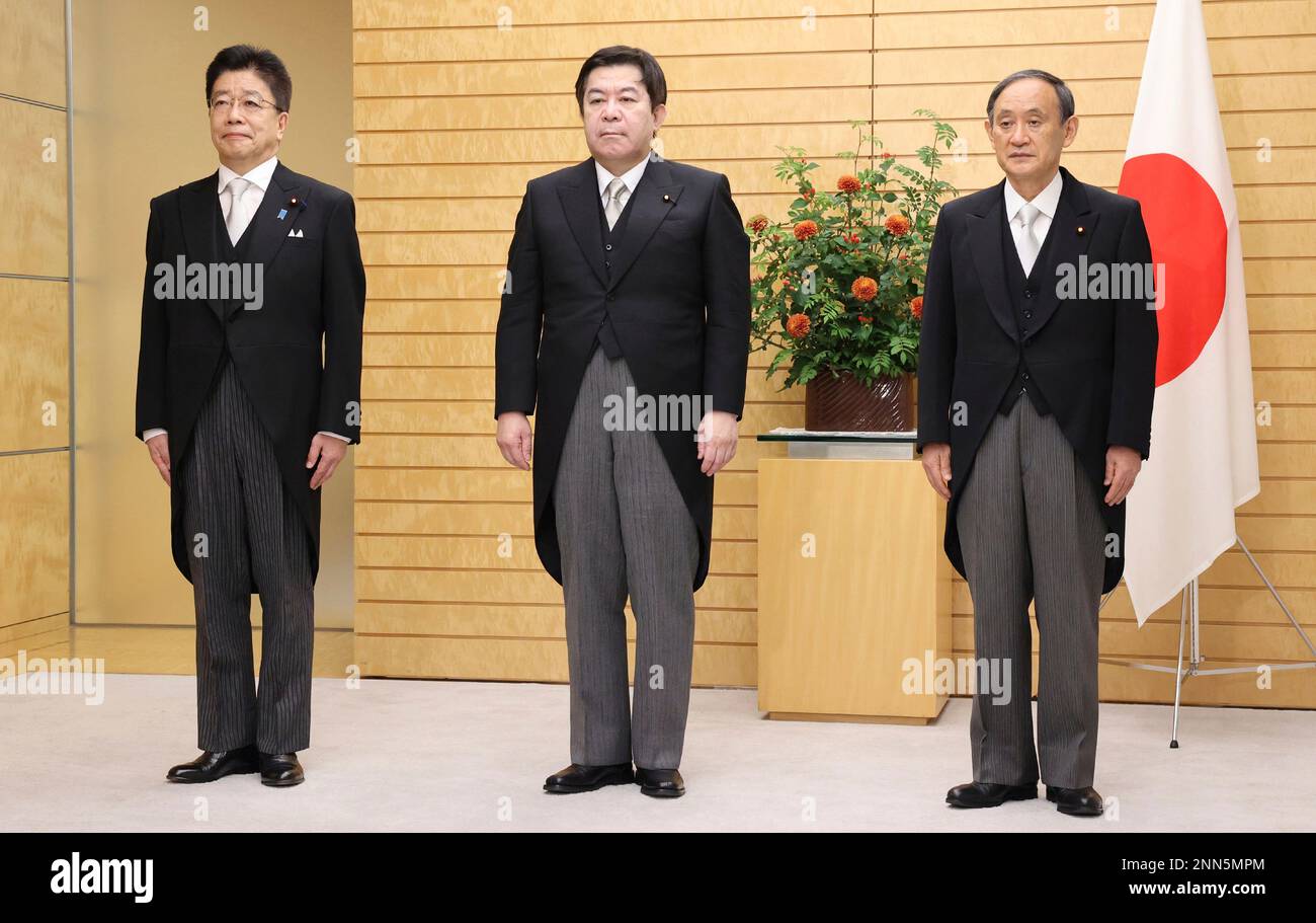 Prime Minister Yoshihide Suga (R) and Katsunobu Kato (L), Chief Cabinet Secretary pose with ...