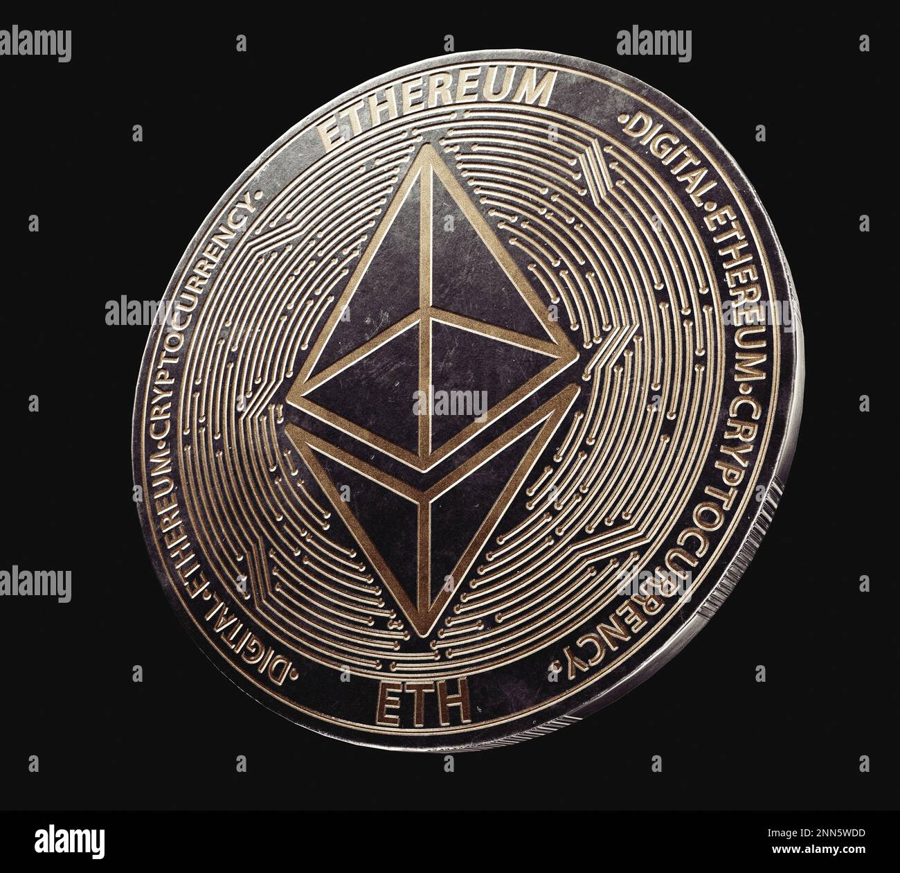 A dimly lit physical ethereum cryptocurrency in bronze and silver coin ...