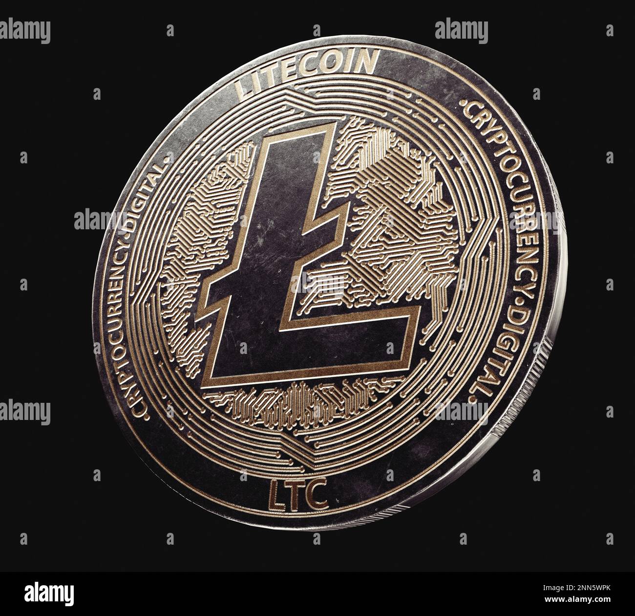 A dimly lit physical Litecoin cryptocurrency in bronze and silver coin ...