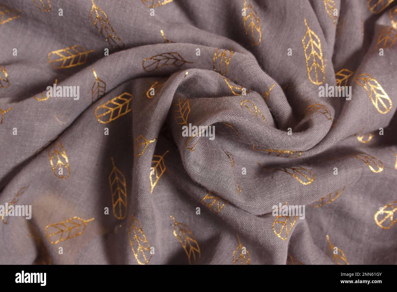 Pile of Gray and Gold Fabric overhead view Stock Photo - Alamy