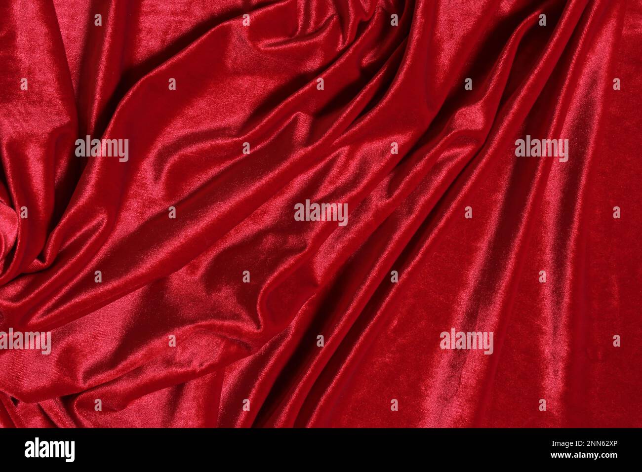 Bundle of Bright Red Velvet Fabric Overhead View Stock Photo - Alamy