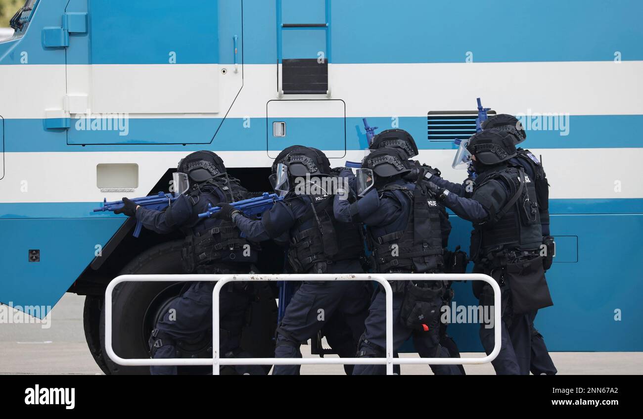 Officers of the Tokyo Metropolitan Police Department (TMPD), condunct a ...