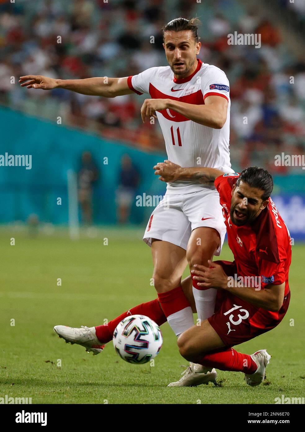 Turkey's Yusuf Yazici, left, challenges Switzerland's Ricardo Rodriguez ...