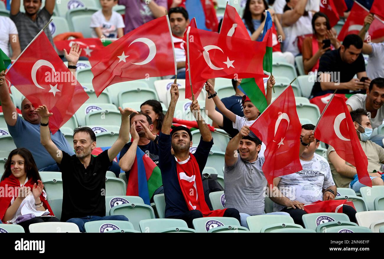 Turkish fans wave flags before the Euro 2020 soccer championship group ...