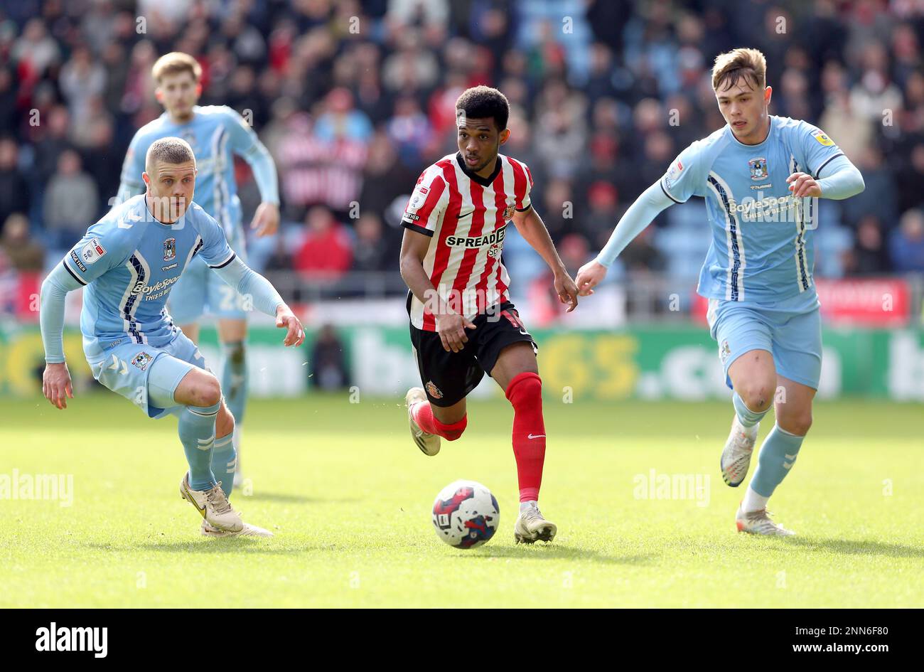 Coventry City's Callum Doyle (right) and Jake Bidwell (left) chase ...